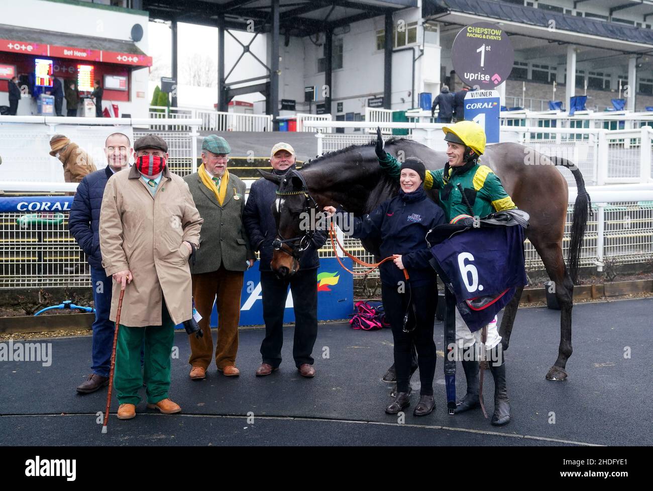 Jockey Paddy Brennan (right) and the winning connections celebrate ...