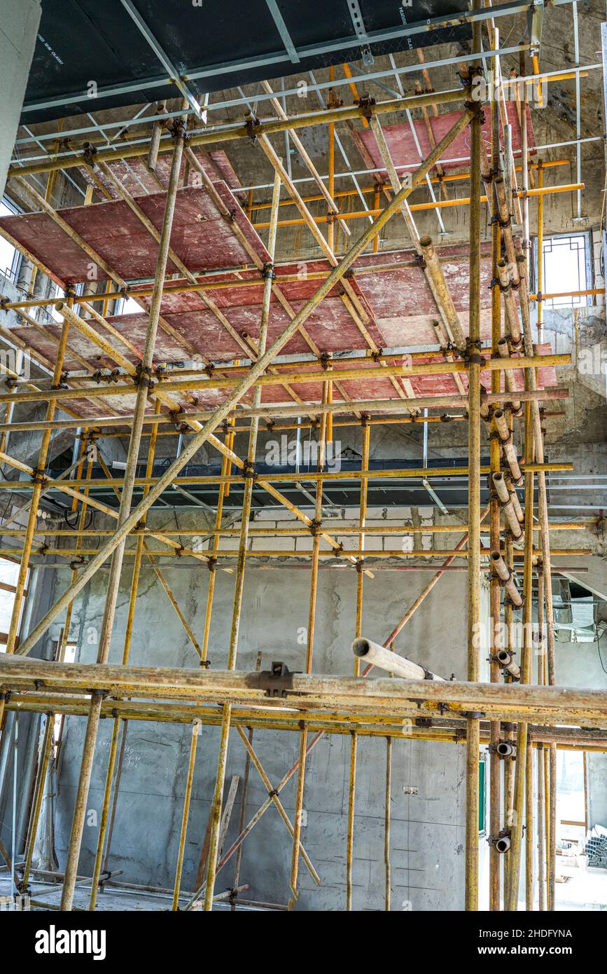 Scaffolding on a renovation site in a commercial storefront office ...