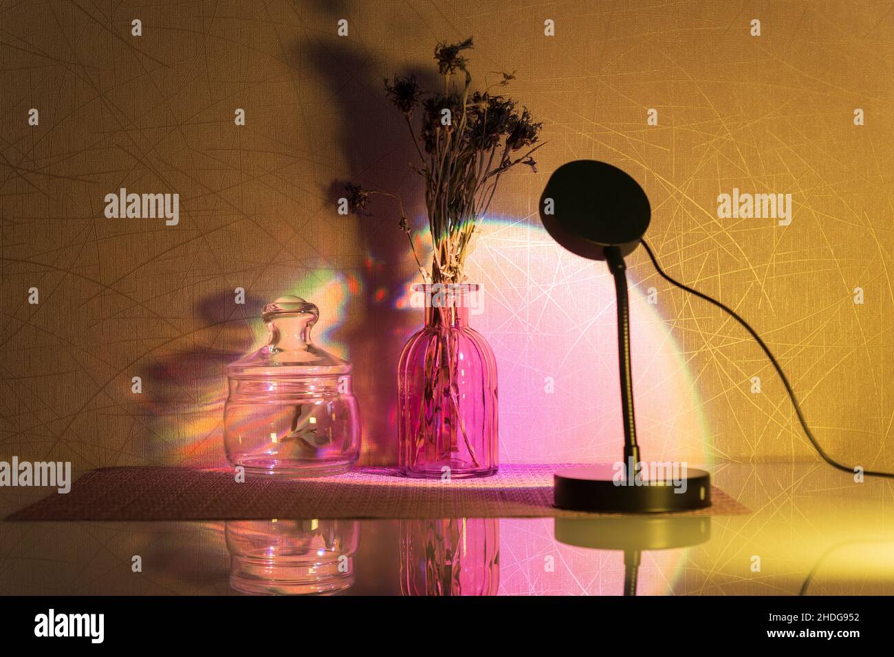 Sunset LED RGB lighting decor. Shadow on surface illuminated by ...