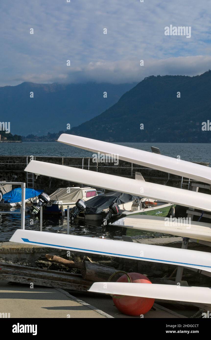 stacked race rowing boats in Cernobbio, Lake Como, Italy Stock Photo ...