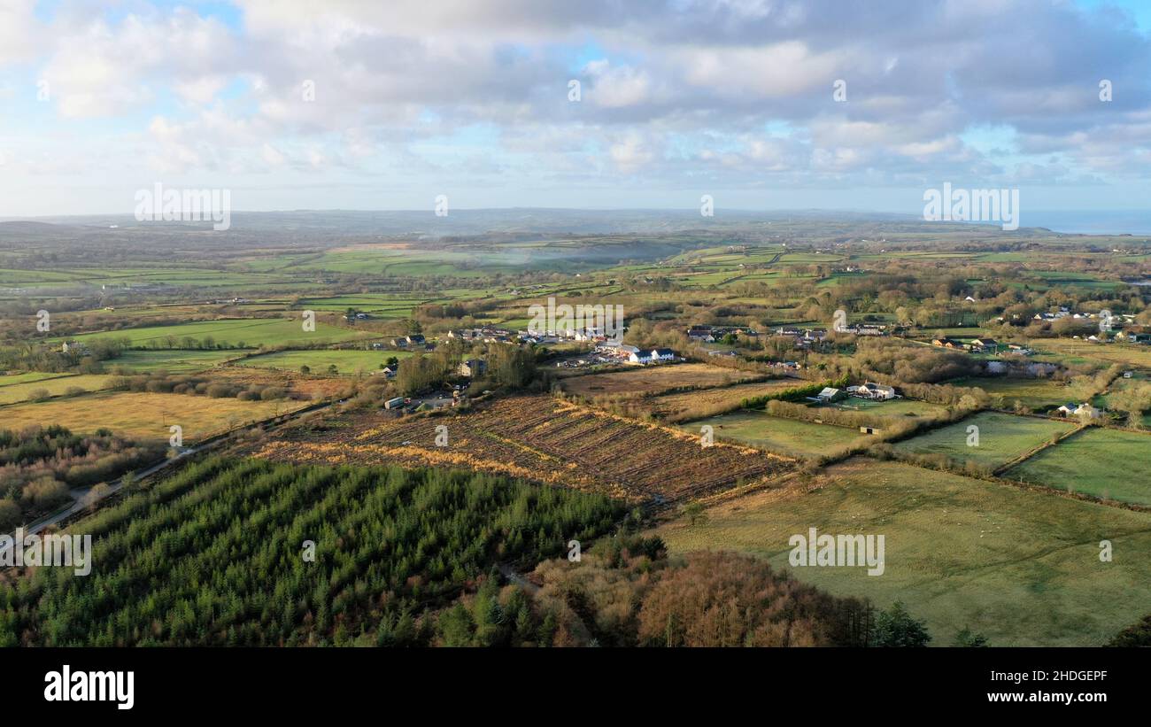 Aerial Photograph Of a Forestry and Village called Cross Inn ...