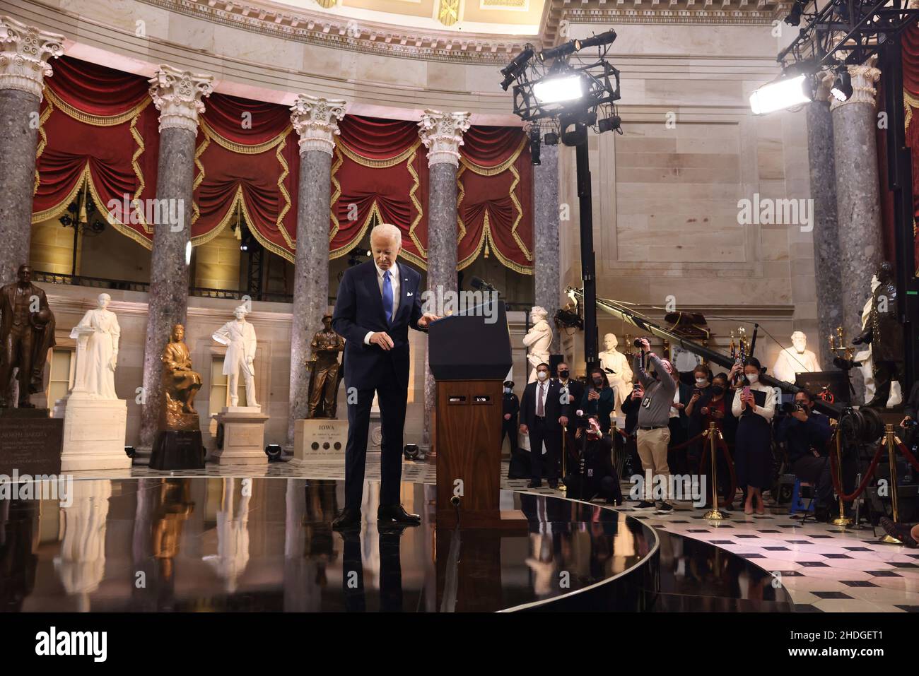US President Joe Biden leaves the podium after delivering remarks on ...