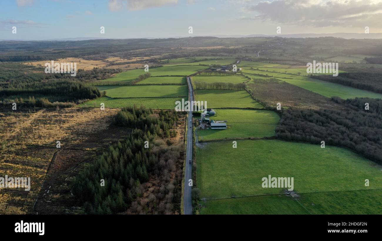 Aerial Photograph Of a Forestry and Village called Cross Inn ...