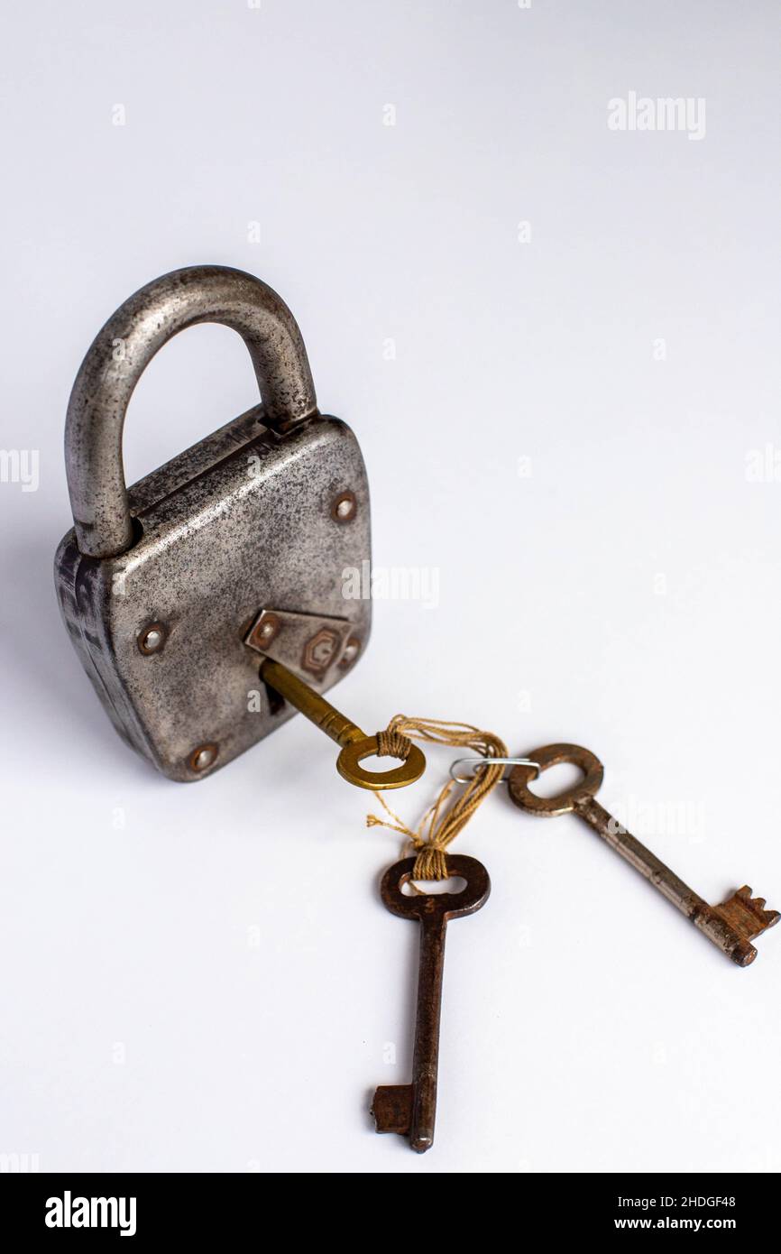 Vintage lock with three keys Stock Photo - Alamy