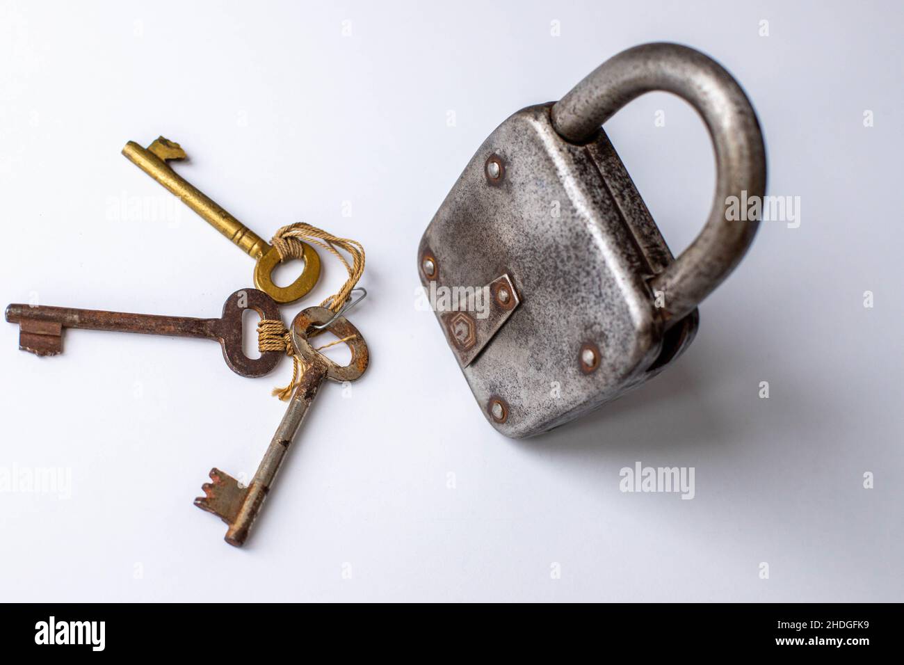 Vintage lock with three keys Stock Photo - Alamy