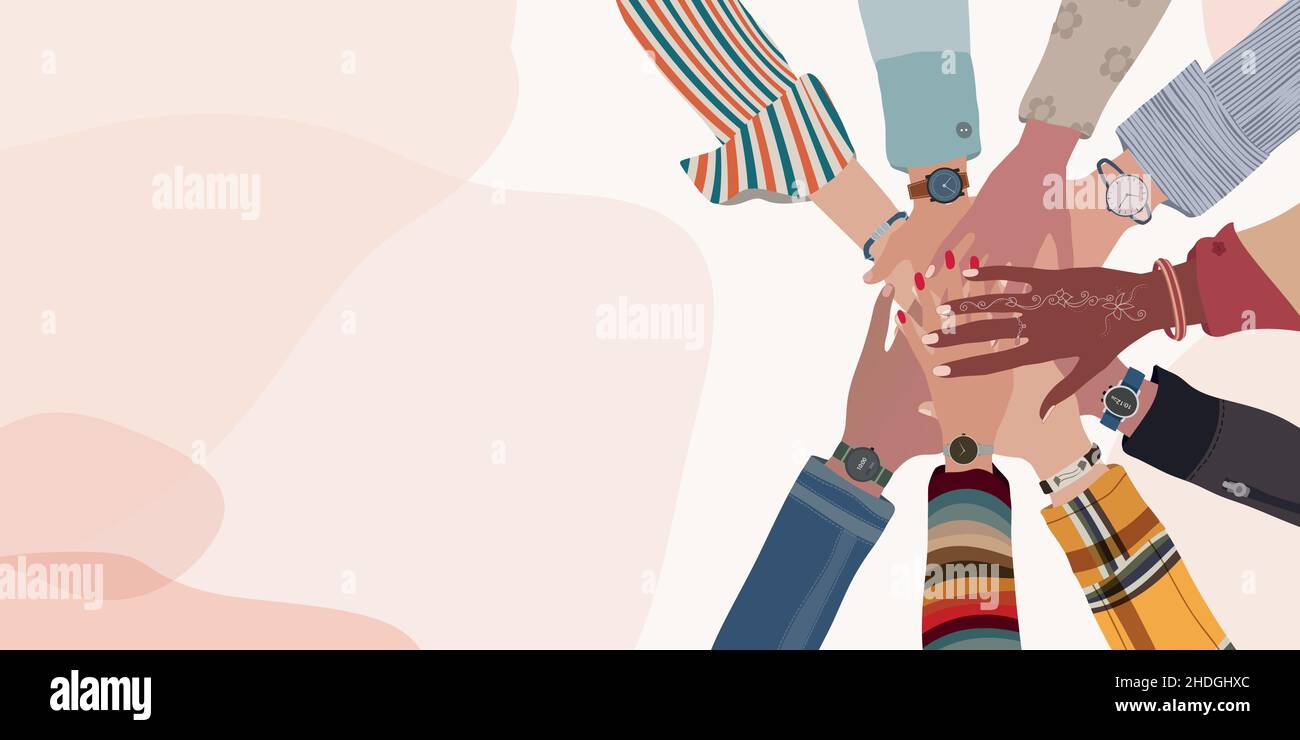 Group hands on top of each other of diverse multi-ethnic and ...