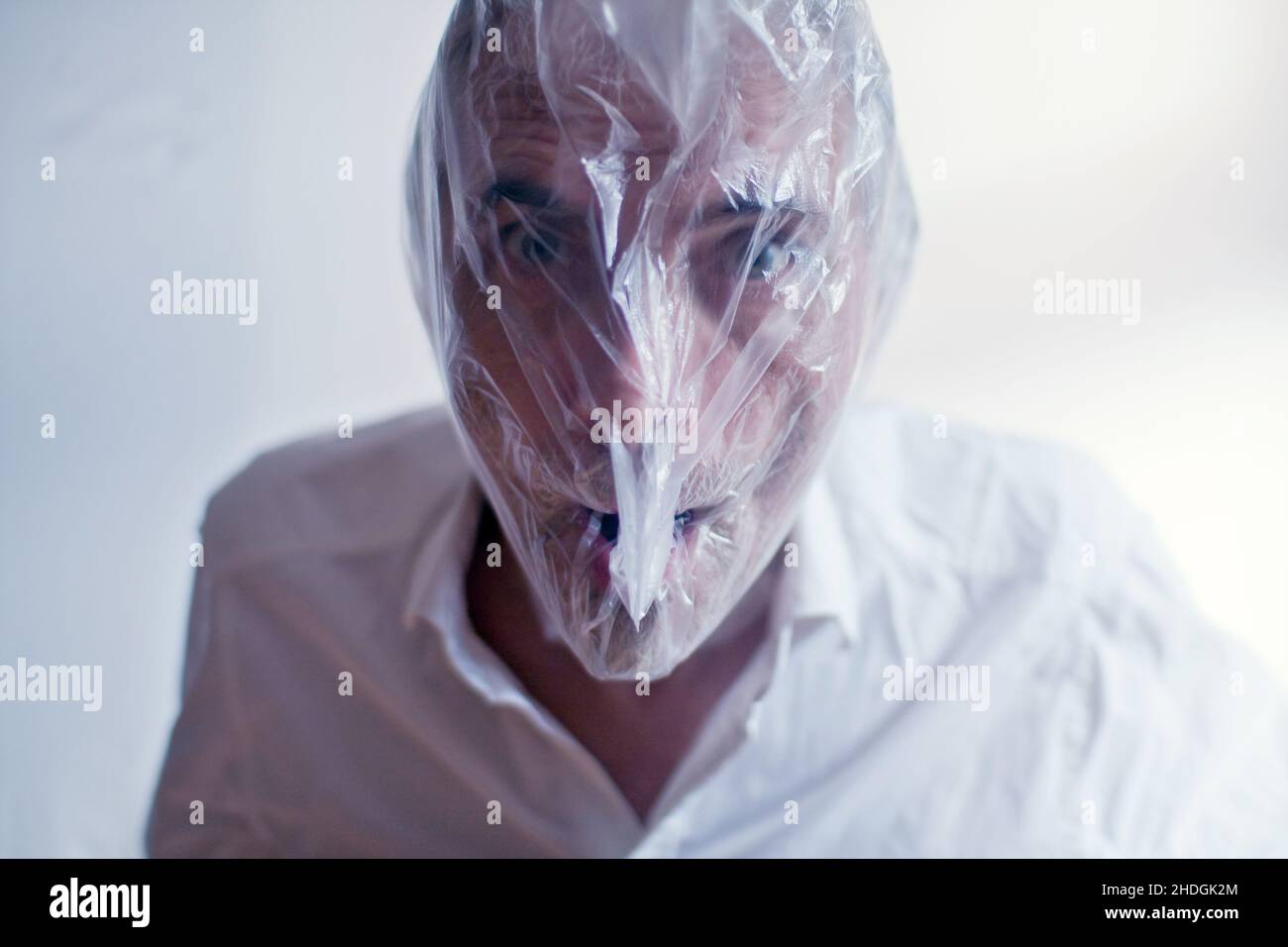 Plastic bag suffocation hi-res stock photography and images - Alamy