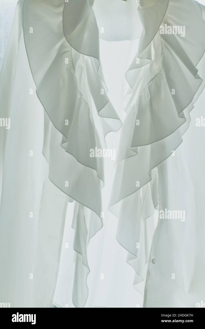 White frilly blouse hi-res stock photography and images - Alamy