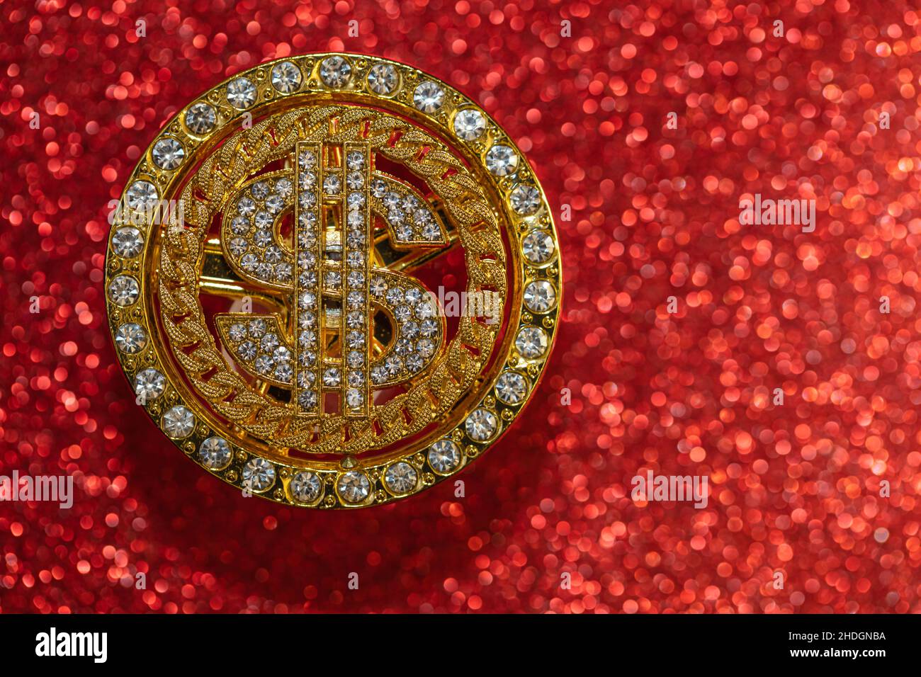golden dollar sign with gemstones on red glitter background for design ...