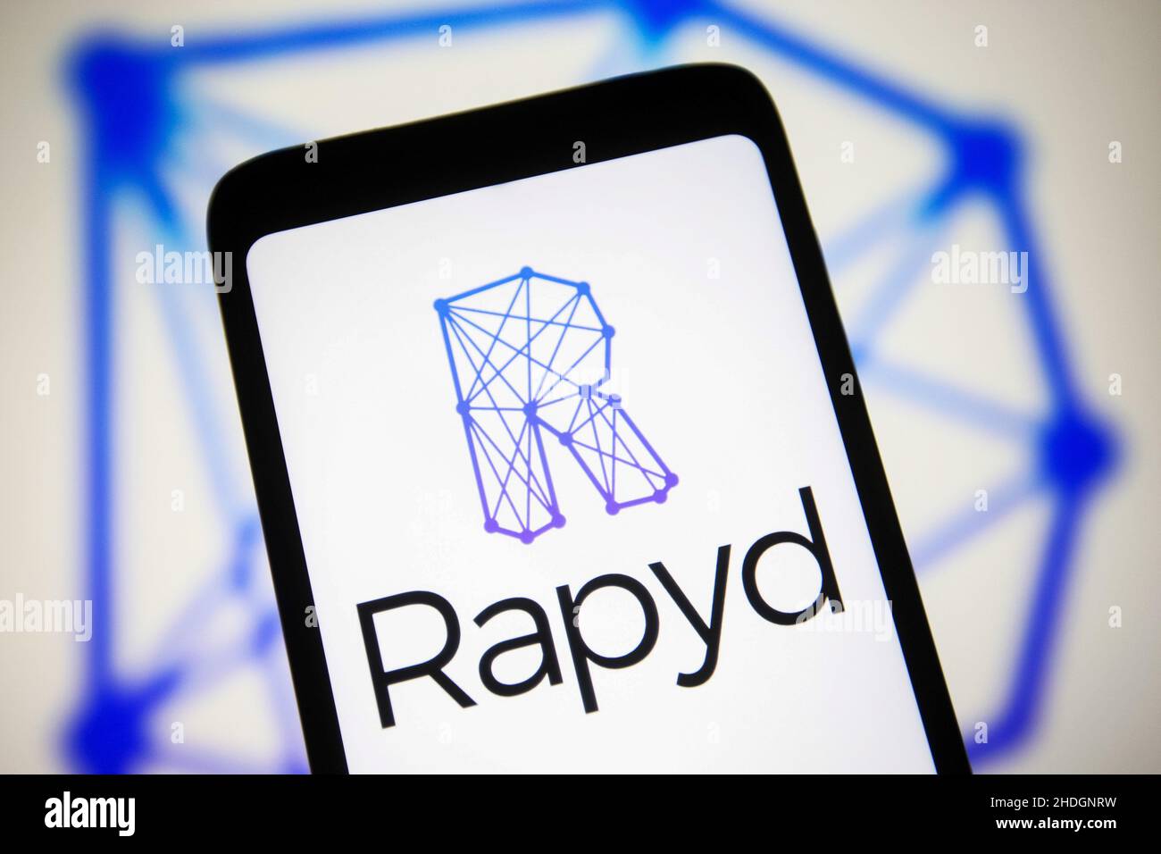 In this photo illustration, Rapyd logo seen displayed on a smartphone ...