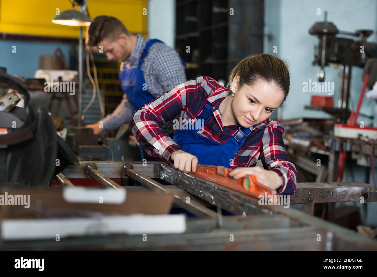 woman is working with level Stock Photo - Alamy