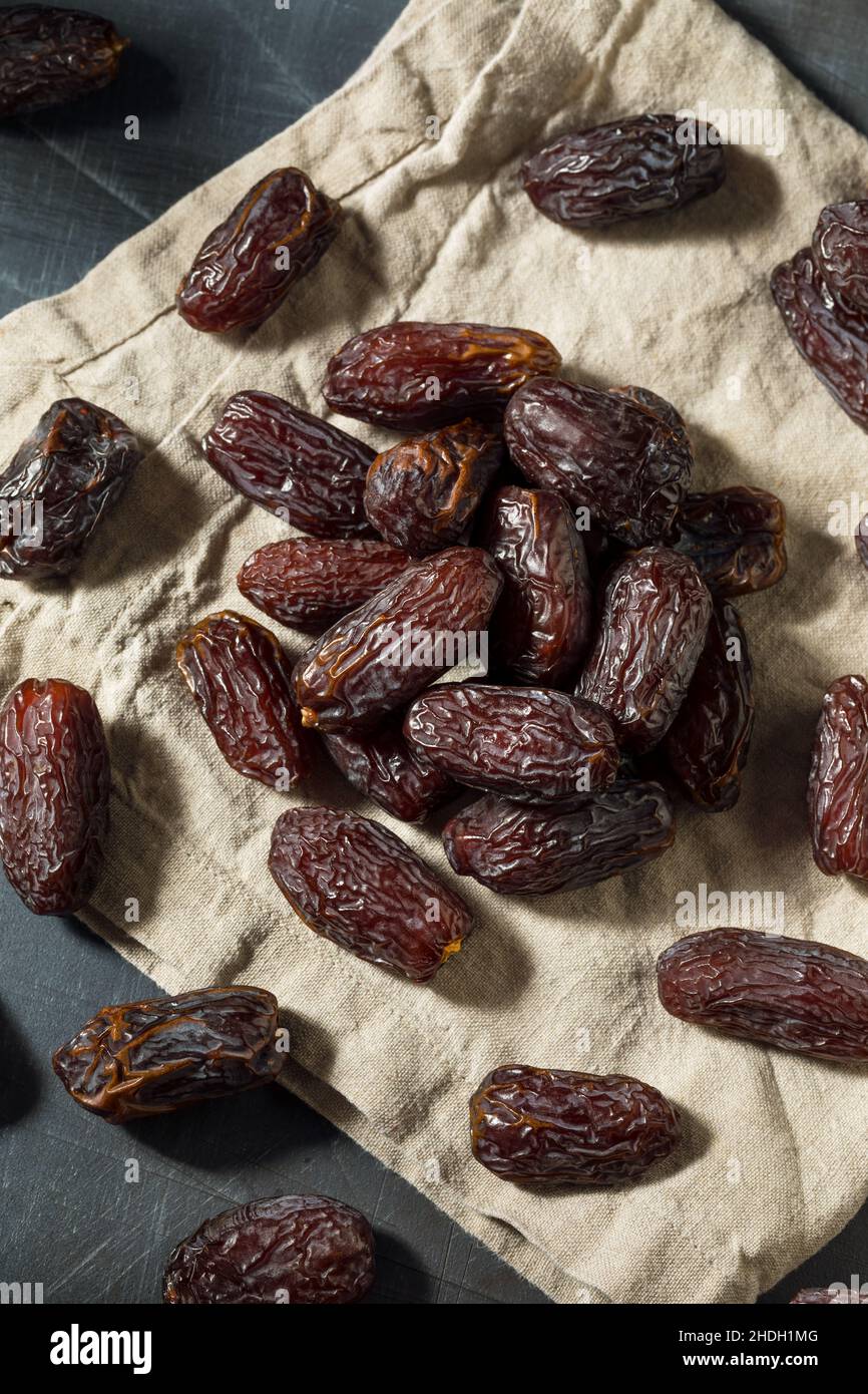 Organic Raw Dry Dates in a Pile Stock Photo - Alamy