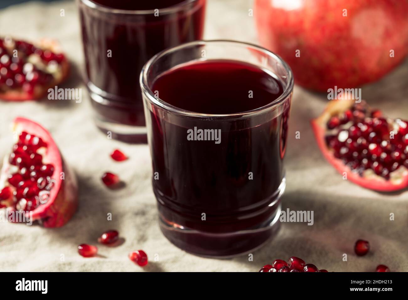 Raw Organic Red Pomegranate Juice Ready to Drink Stock Photo - Alamy