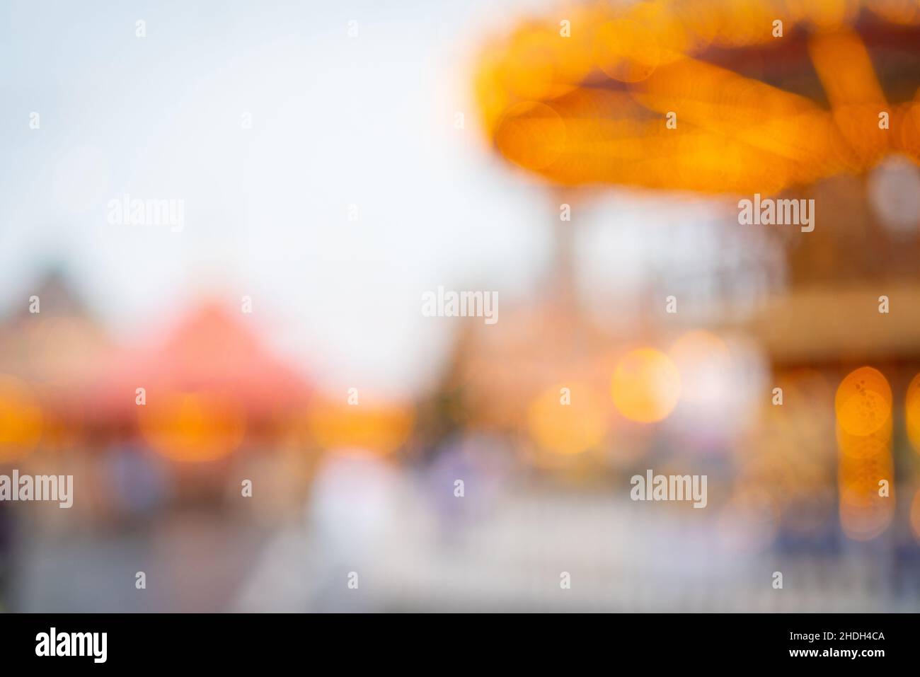Blurred carousel at the fair. Abstract blurred yellow background Stock ...