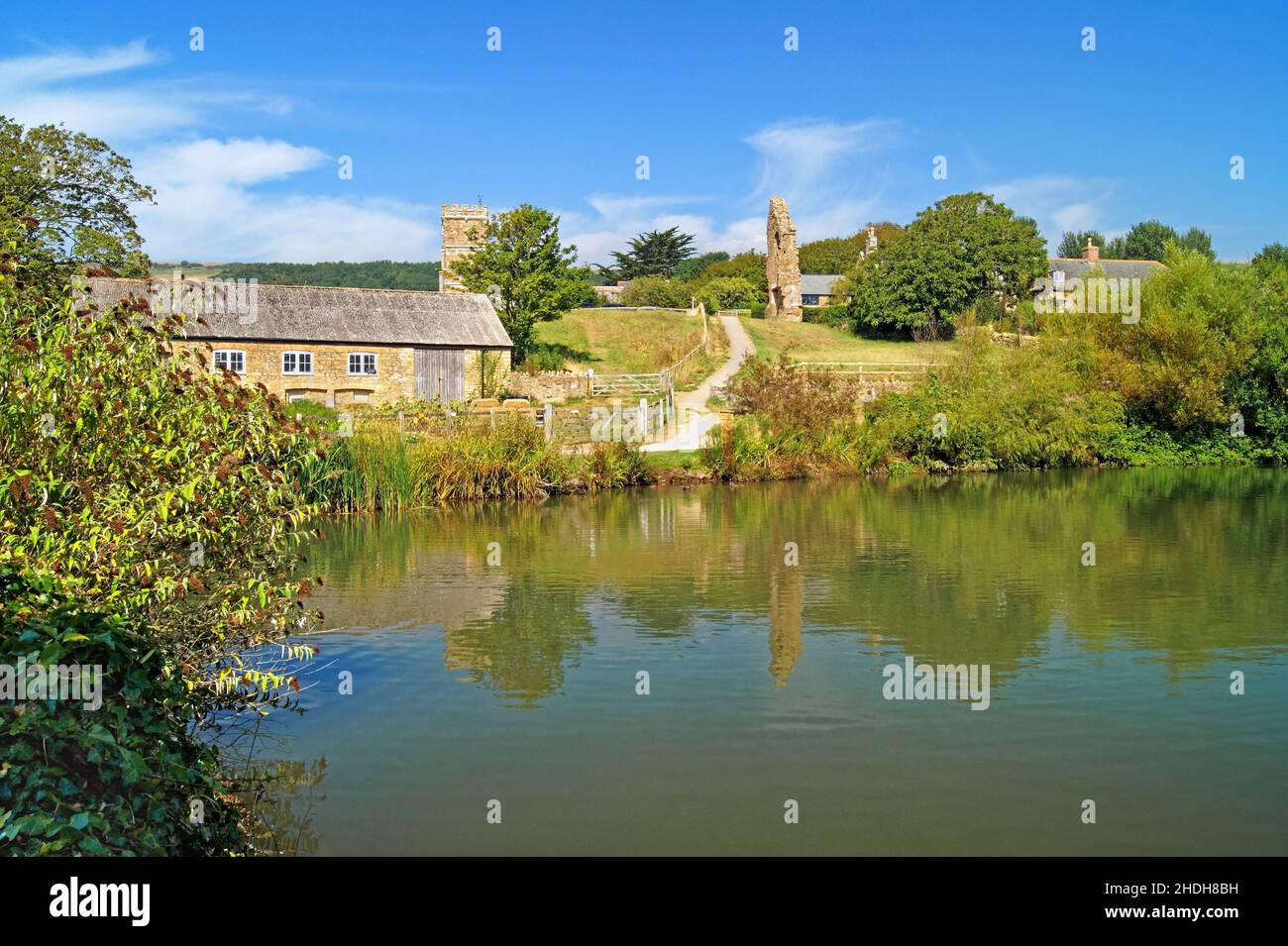 UK, Dorset, Abbotsbury Abbey Remains, St Nicholas Church and Mill Pond ...