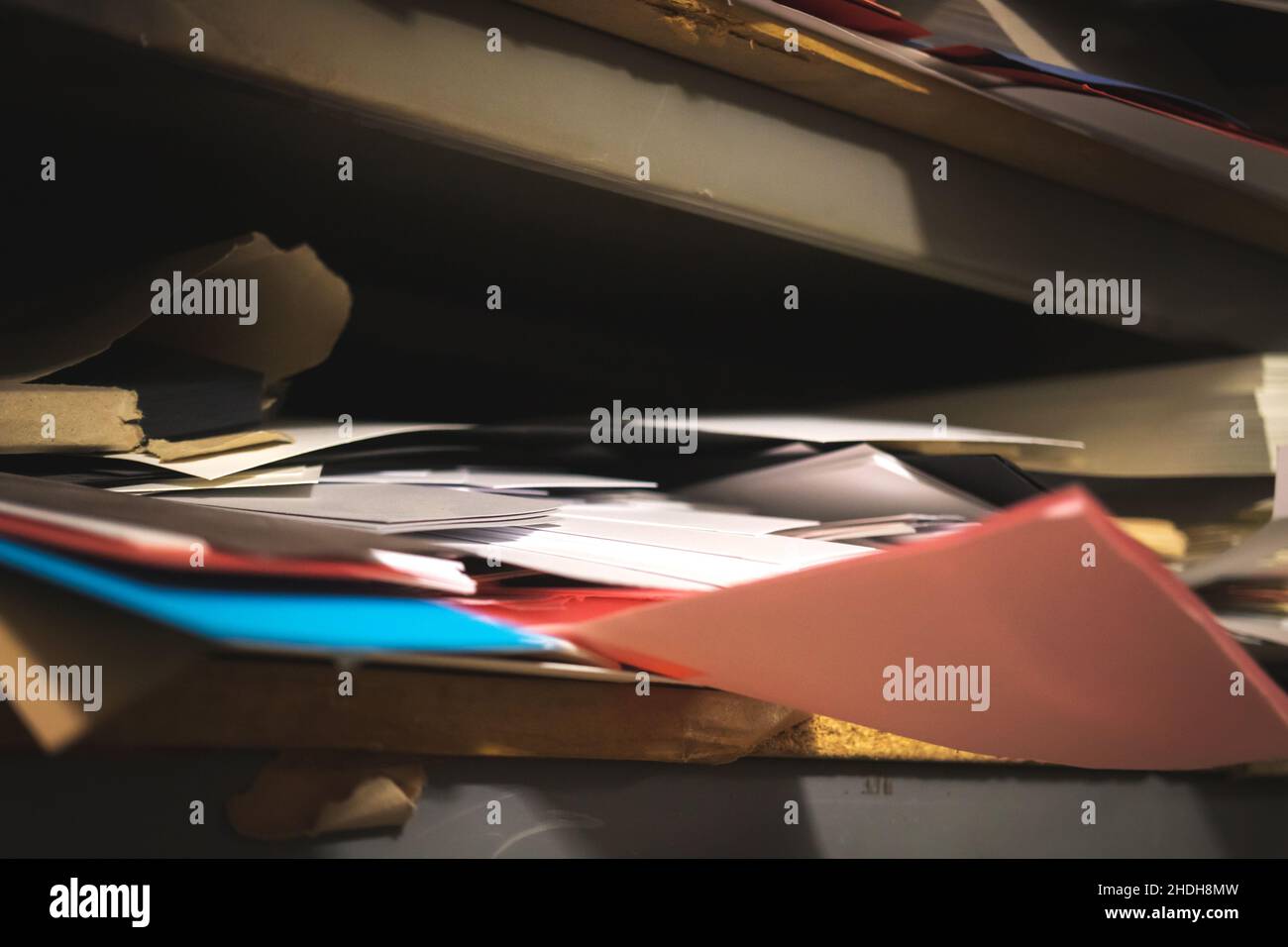 Colorful paper warehouse, paper on shelf in printing house Stock Photo ...