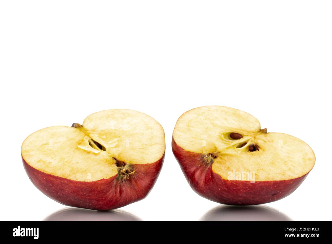 Two halves of a ripe red apple, close-up, isolated on white Stock Photo ...