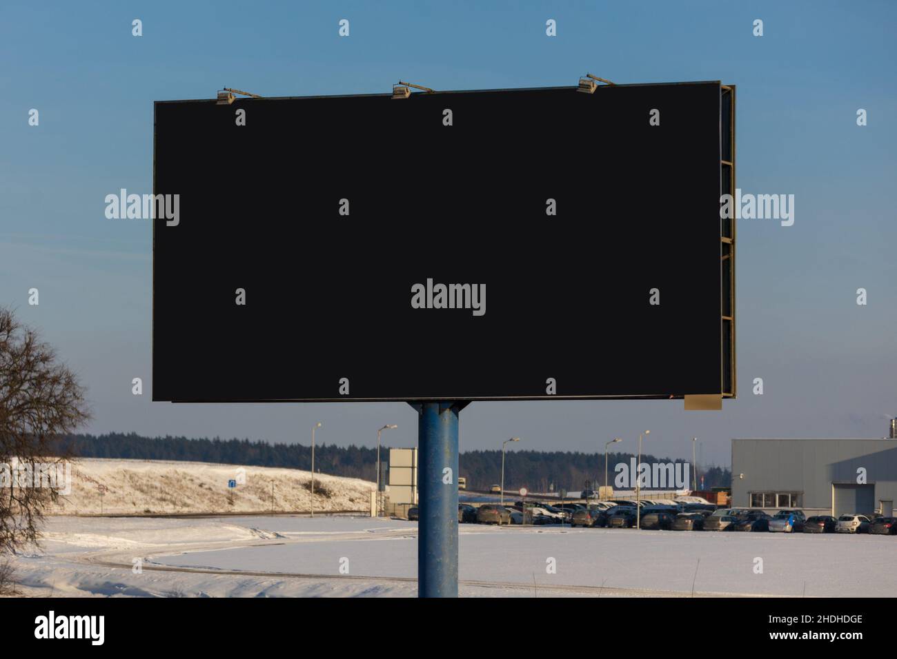 white billboard along the highway on a winter snow day. Background for ...