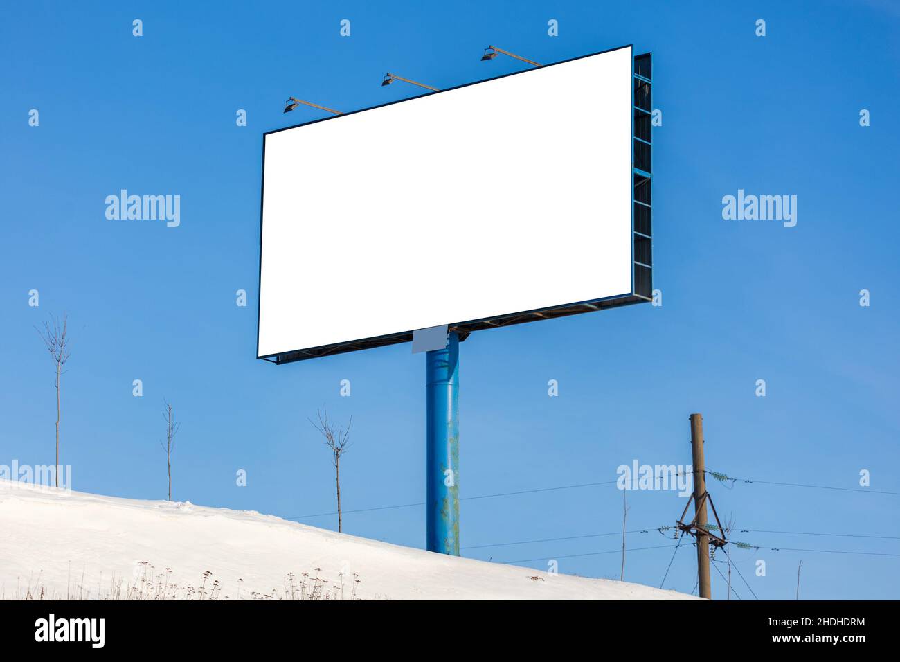 white billboard along the highway on a winter snow day. Background for ...