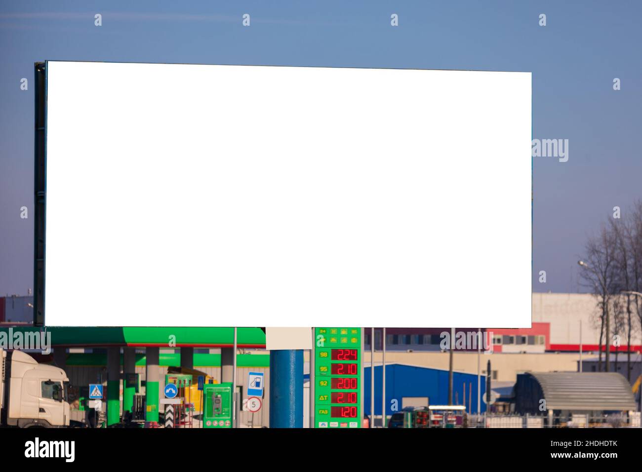 white billboard along the highway on a winter snow day. Background for ...