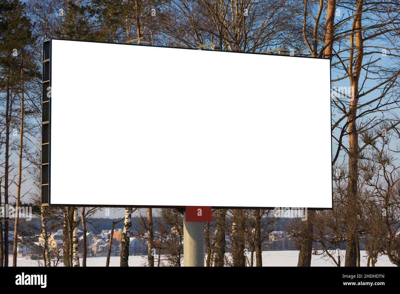 white billboard along the highway on a winter snow day. Background for ...
