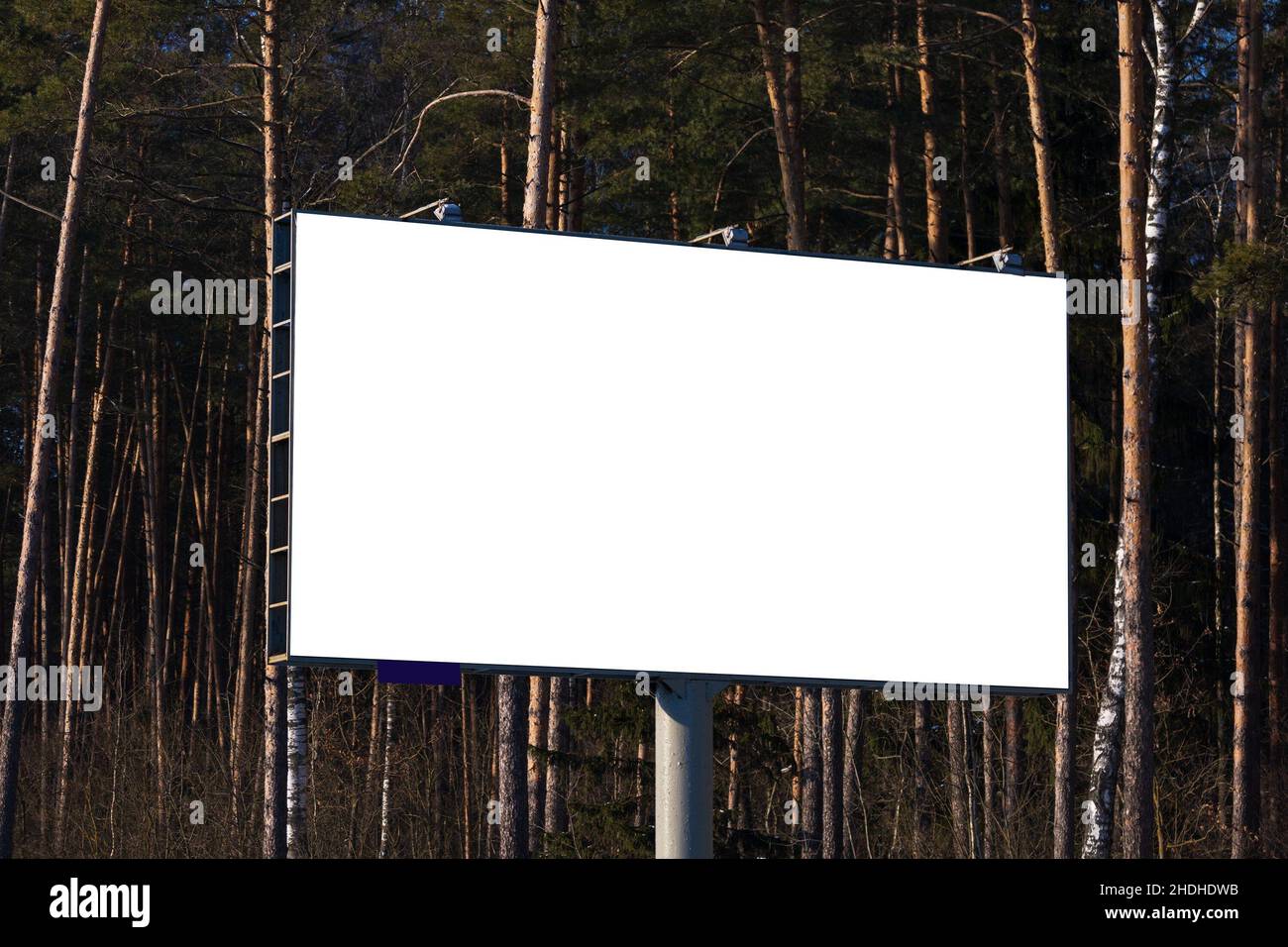 white billboard along the highway on a winter snow day. Background for ...