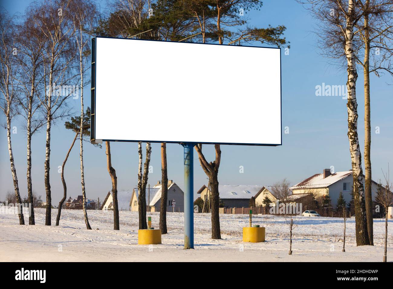 white billboard along the highway on a winter snow day. Background for ...
