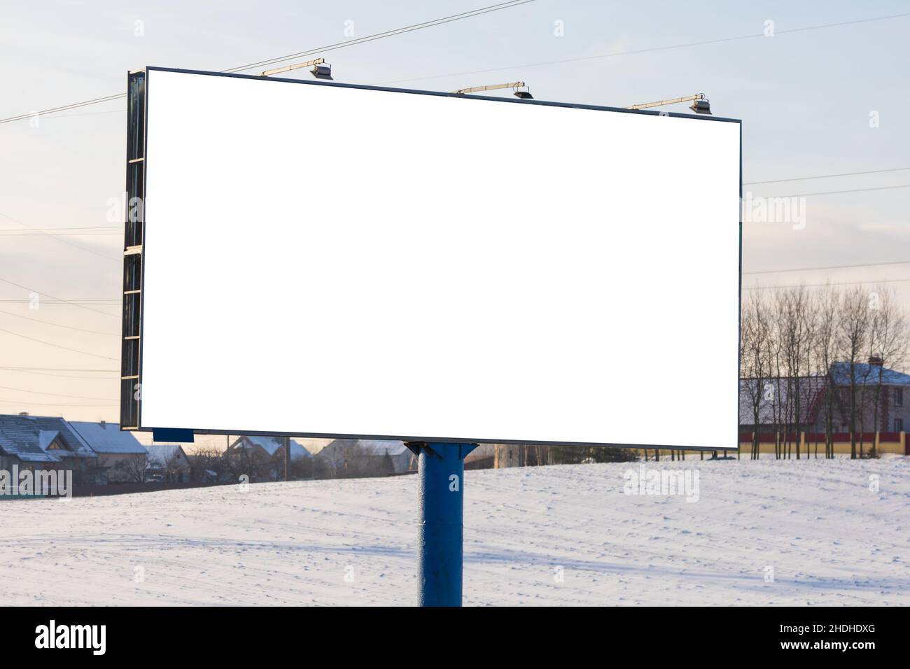 white billboard along the highway on a winter snow day. Background for ...
