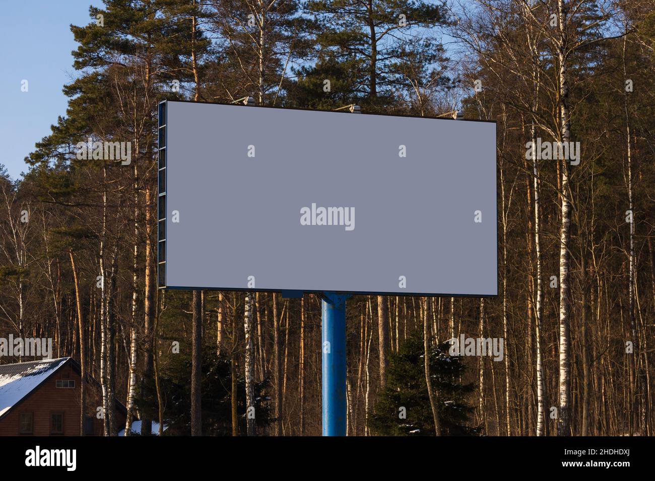 white billboard along the highway on a winter snow day. Background for ...