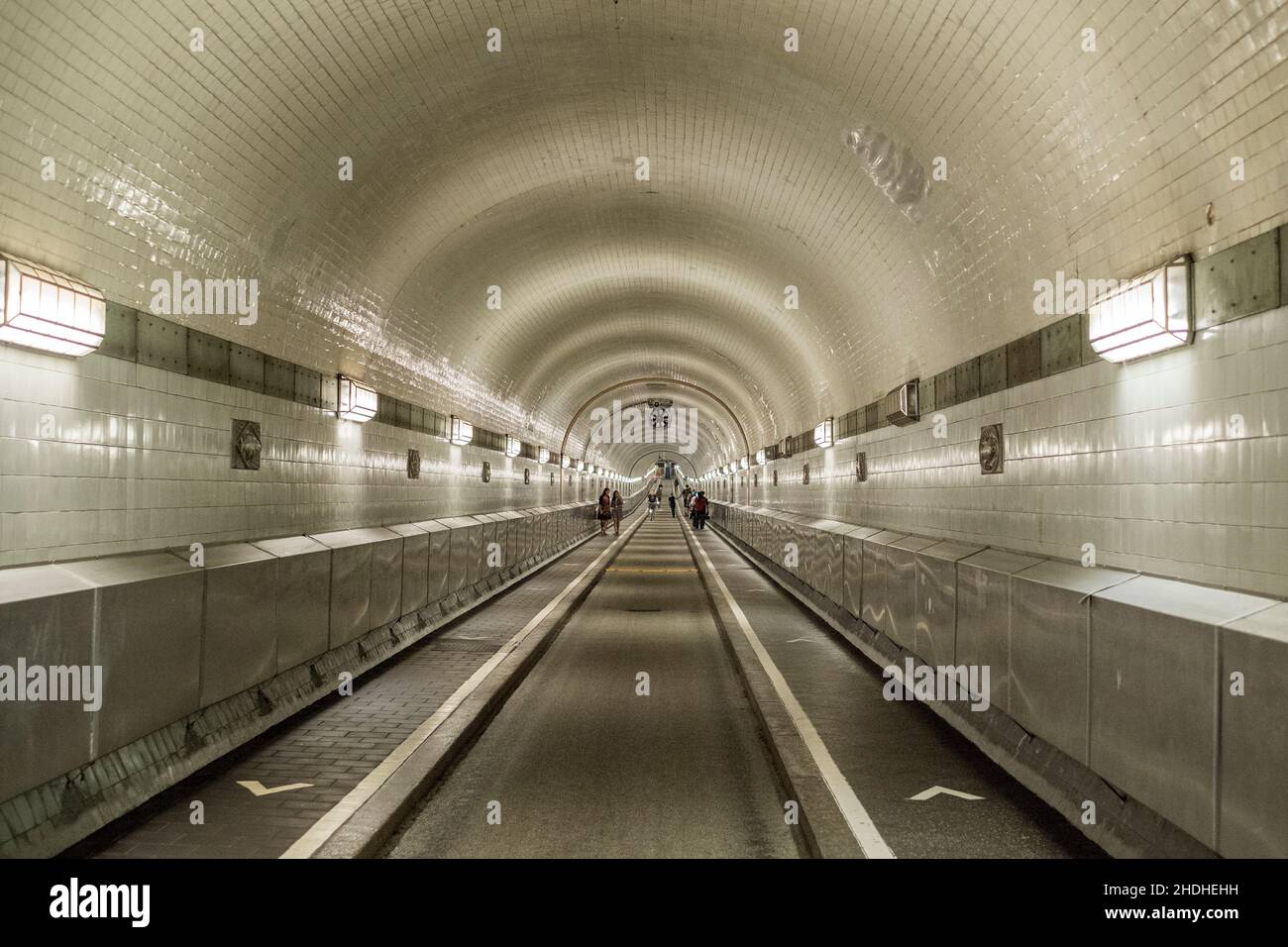 People walk in tunnel hi-res stock photography and images - Alamy