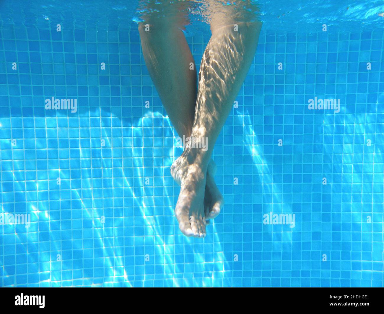 Underwater legs pool hi-res stock photography and images - Alamy