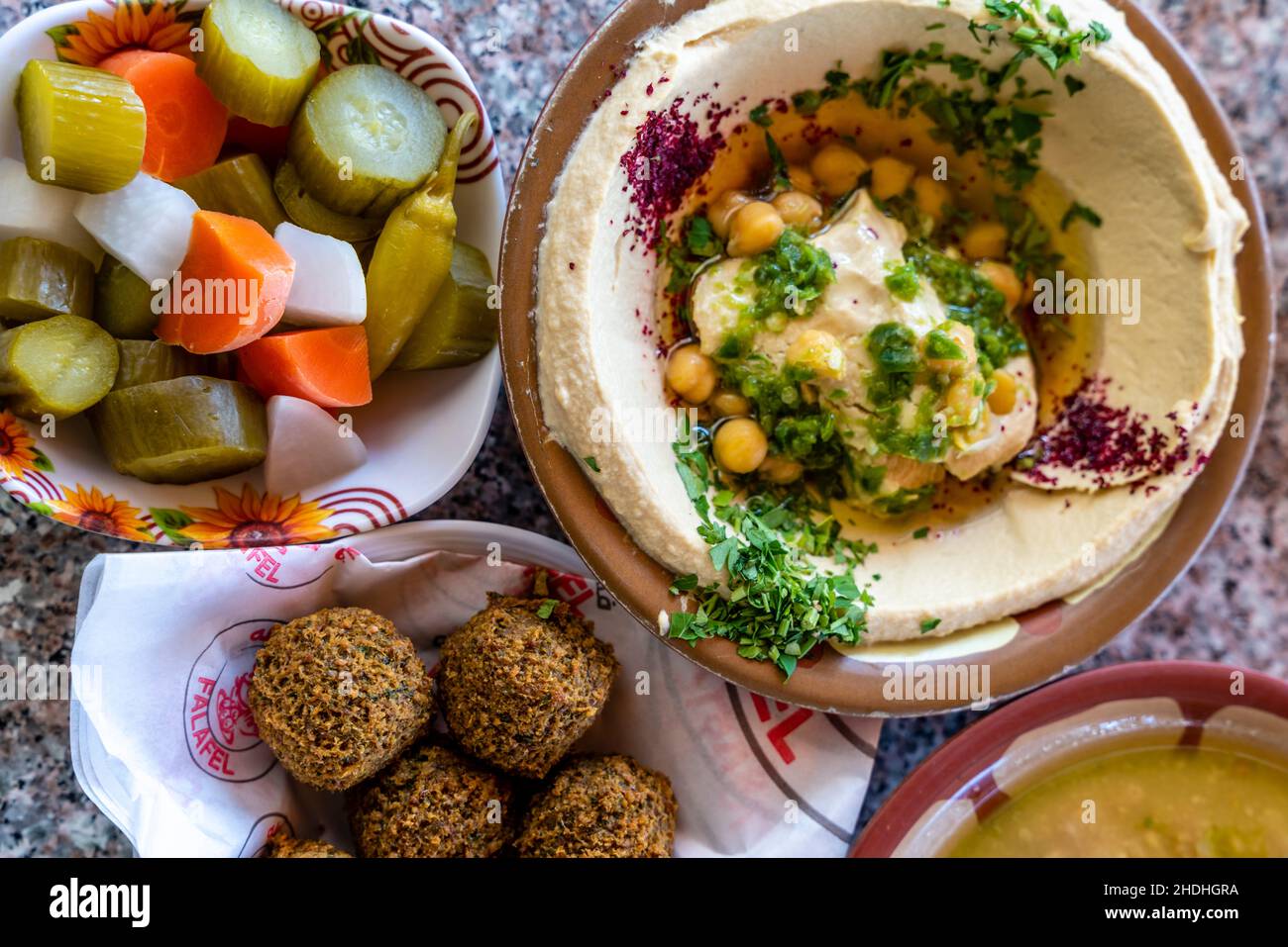 Traditional Jordanian/Arabic Dishes Of Falafel, Hummus and Pickles ...