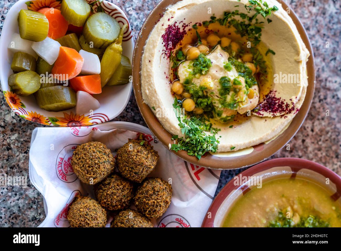 Traditional Jordanian/Arabic Dishes Of Falafel, Hummus and Pickles ...