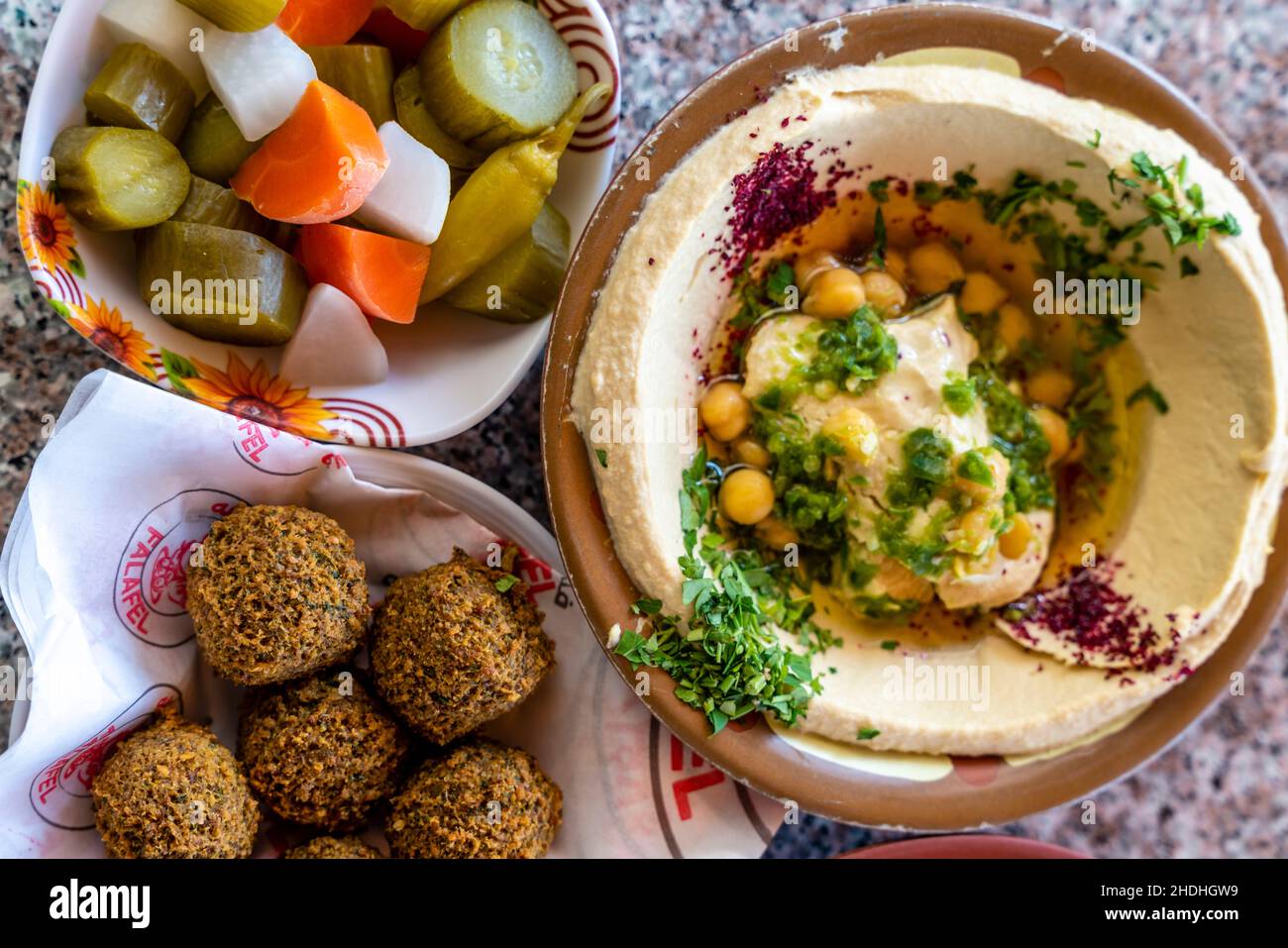 Traditional Jordanian/Arabic Dishes Of Falafel, Hummus and Pickles ...