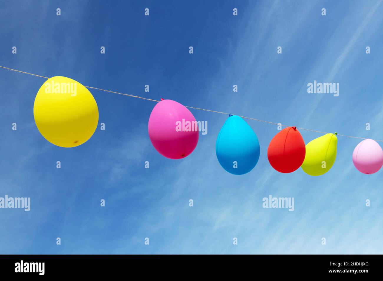 Colorful balloons on sky hi-res stock photography and images - Alamy