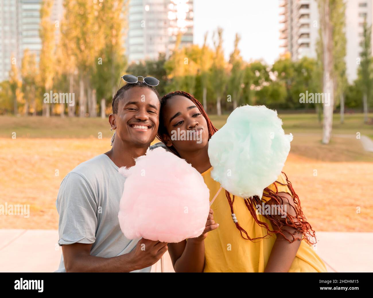 Couple eating candy floss hi-res stock photography and images - Alamy