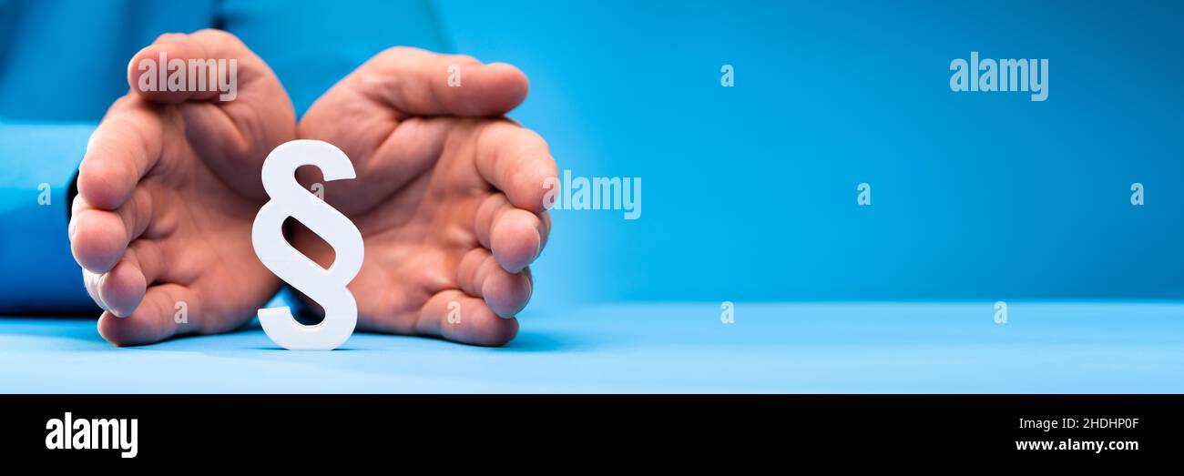 Businessperson's Hand Holding Paragraph Symbol. Legal Court Stock Photo ...