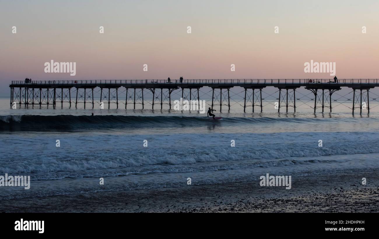 Saltburn pier surfers hi-res stock photography and images - Alamy