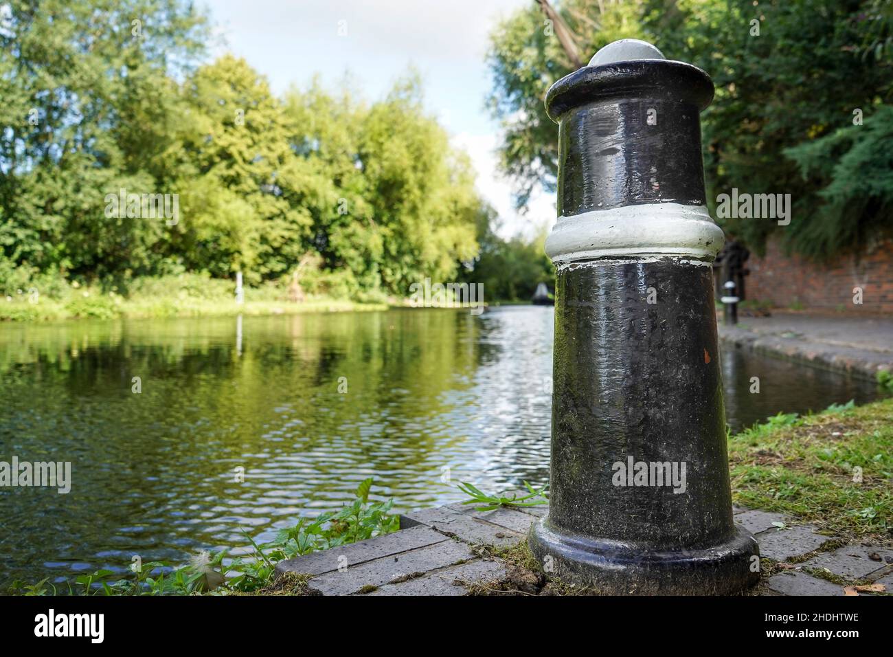 Mooring post alongside a canal Stock Photo - Alamy