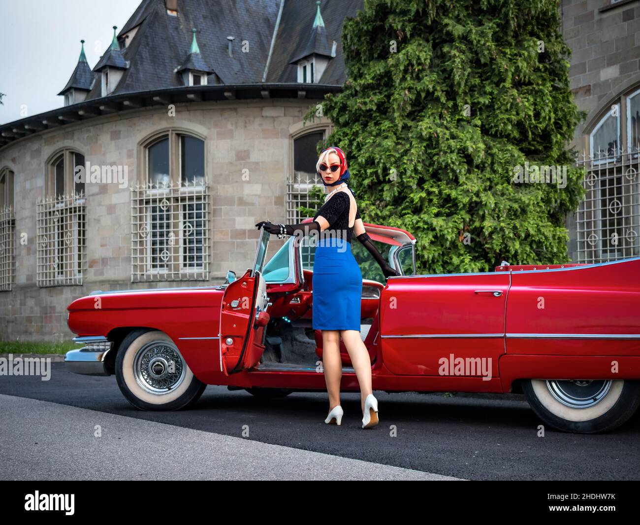 Old-timer red Cadillac and a beautiful young girl. France Stock Photo ...