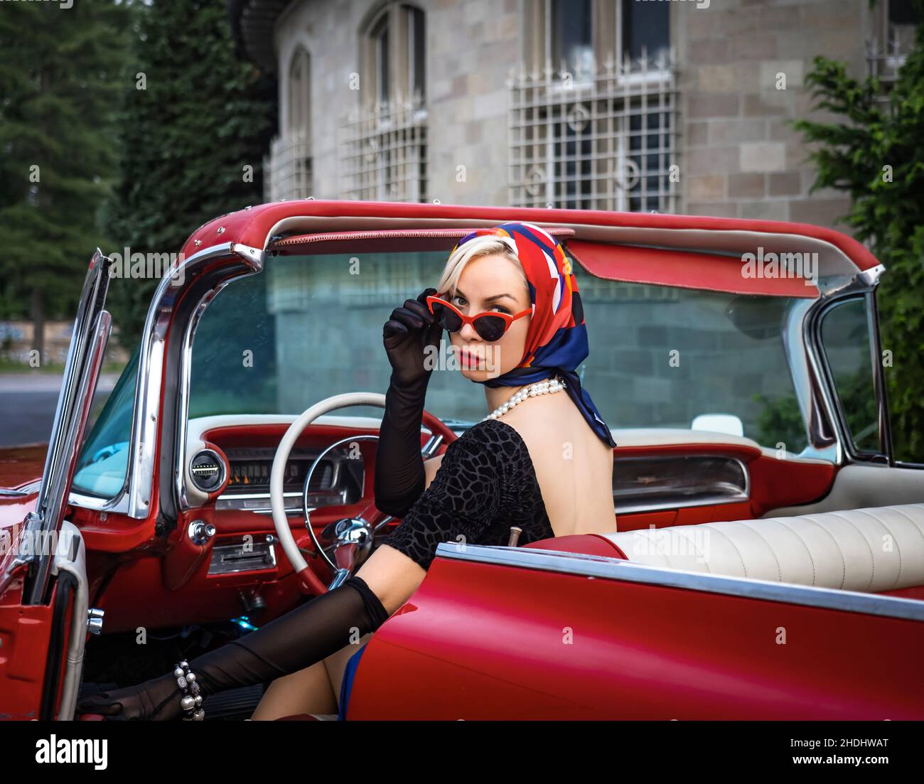 Old-timer red Cadillac and a beautiful young girl. France Stock Photo ...