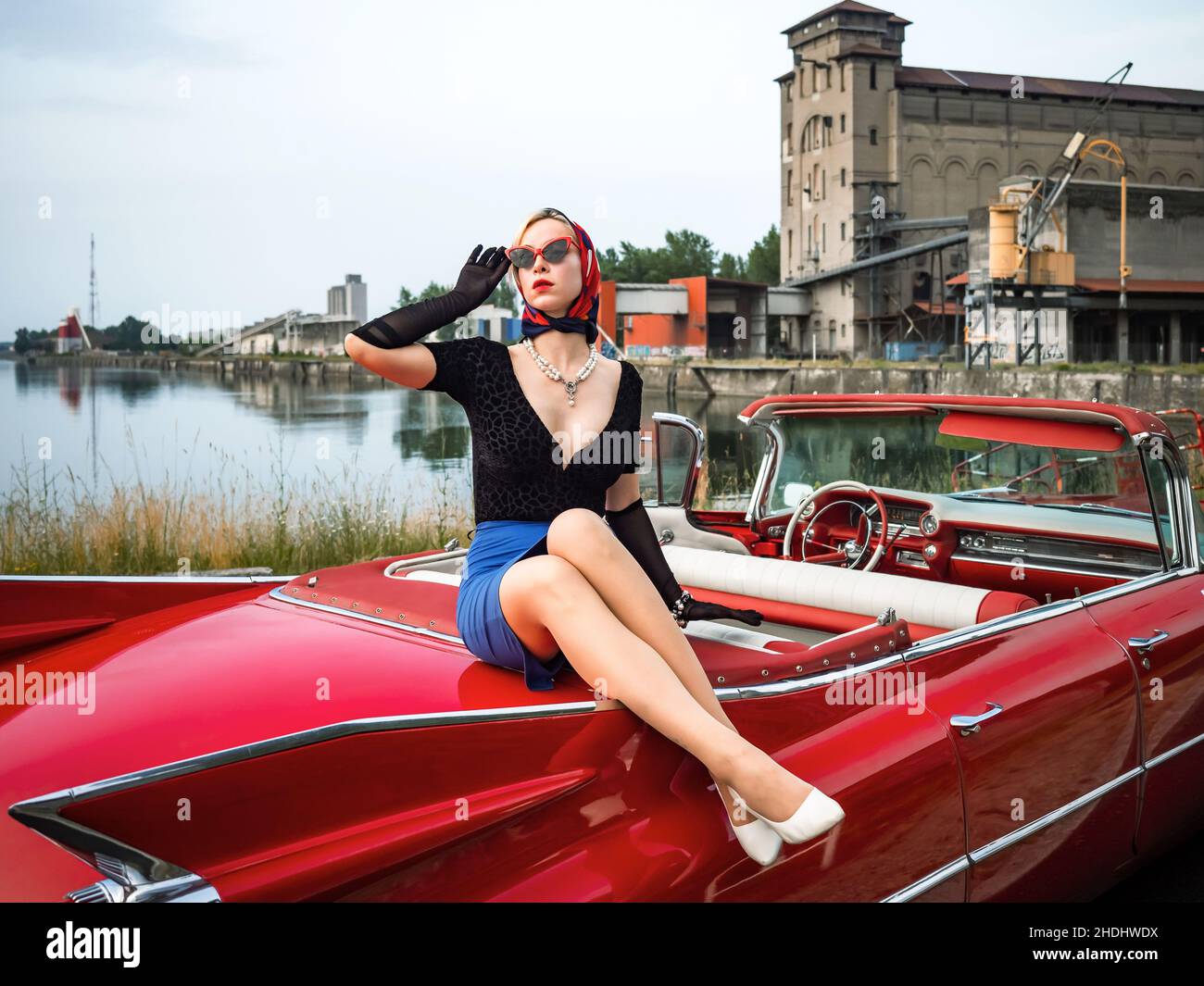 Old-timer red Cadillac and a beautiful young girl. France Stock Photo ...