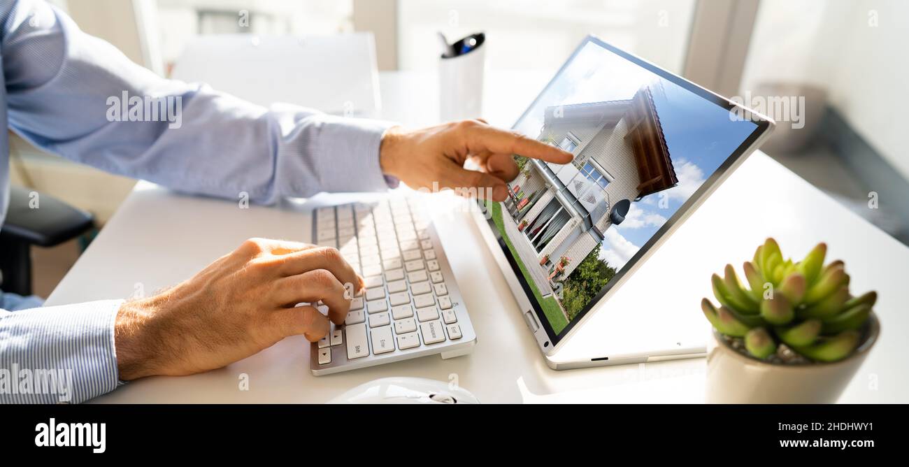 Online Real Estate Home Search On Laptop Computer Stock Photo - Alamy