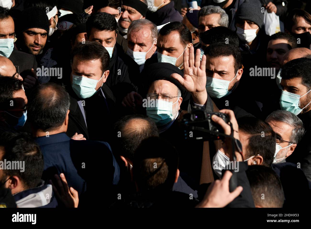 The president of Iran, Ebrahim Raisi walks during the funeral in Tehran ...