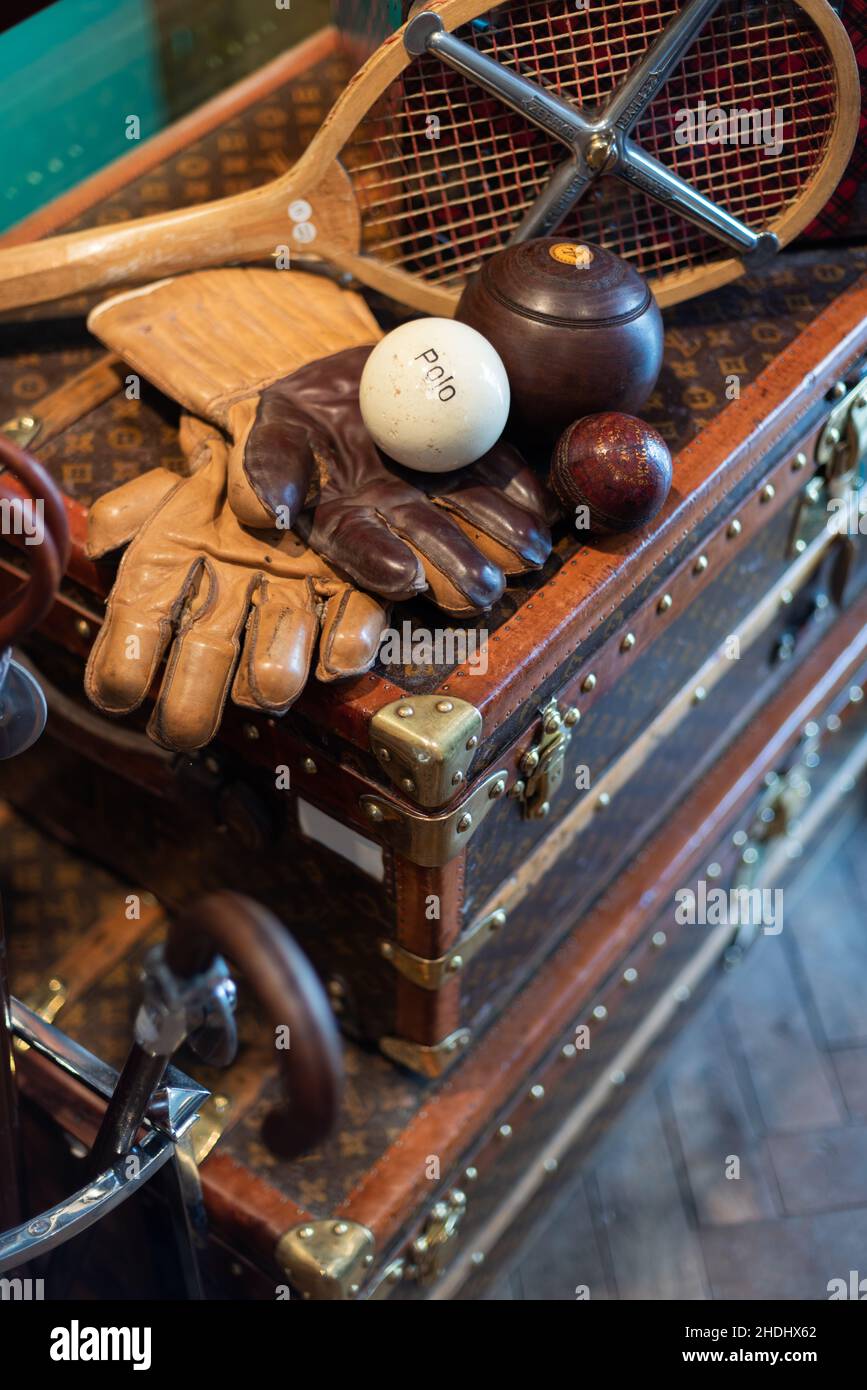 A selection of vintage sports equipment (including a racket, gloves ...
