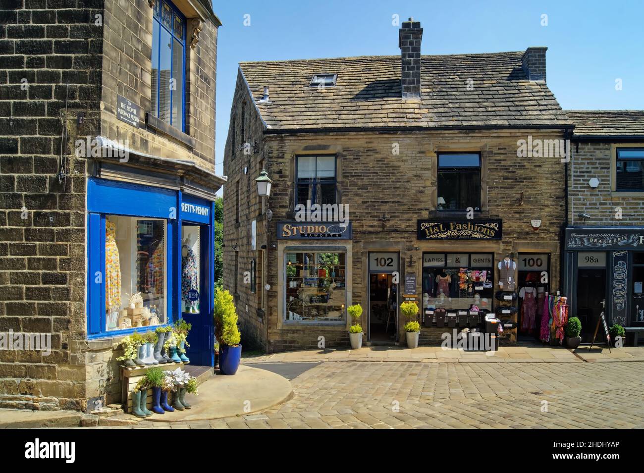 UK, West Yorkshire, Haworth, Main Street Shops Stock Photo - Alamy