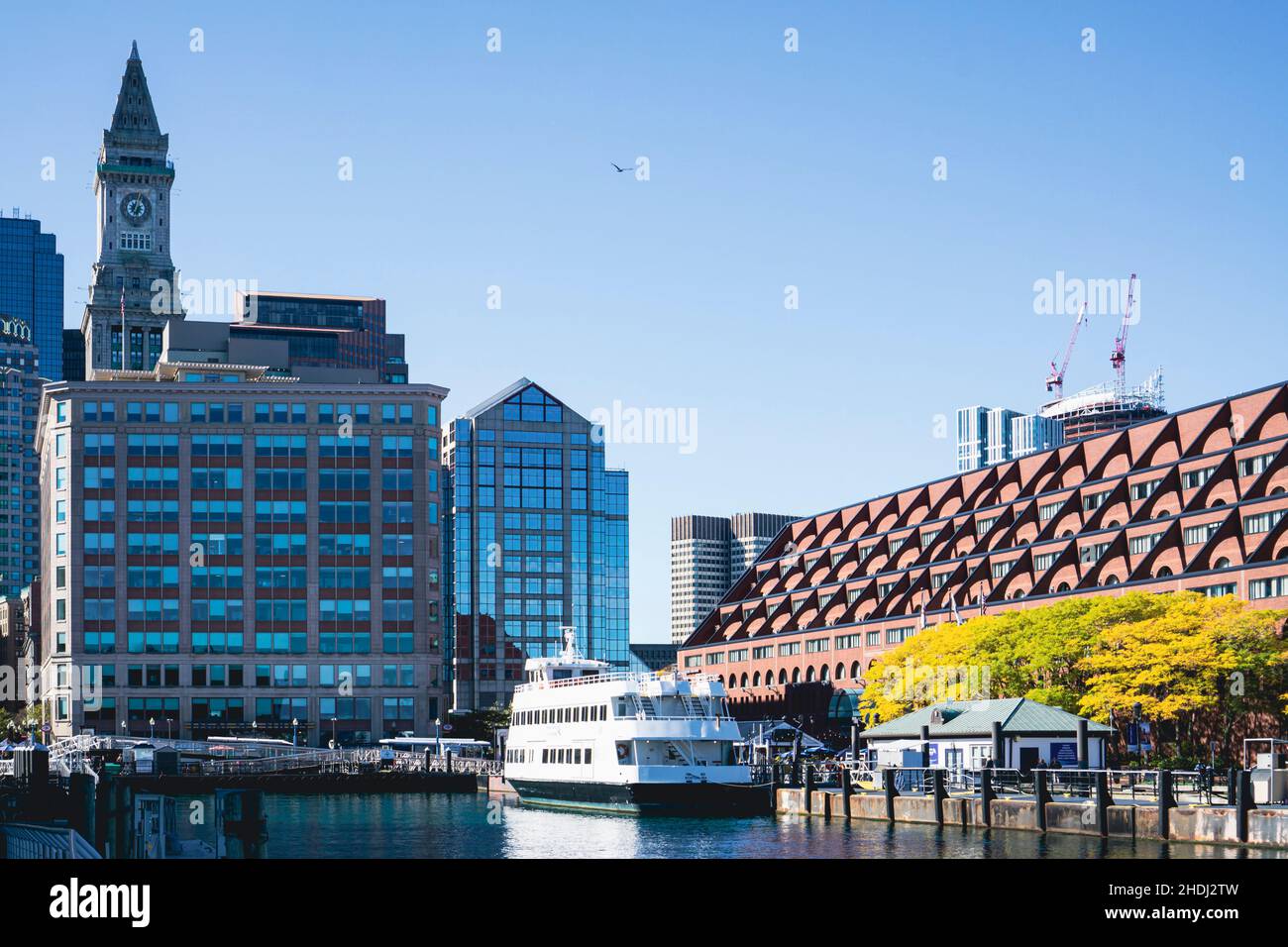 View of Buildings and waterfront with a charter boat docked in Boston ...