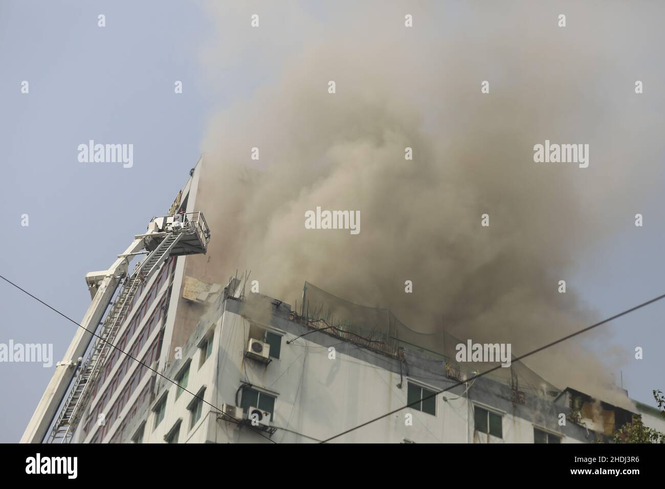 Dhaka, Bangladesh. 06th Jan, 2022. Firefighters try to douse the fire ...