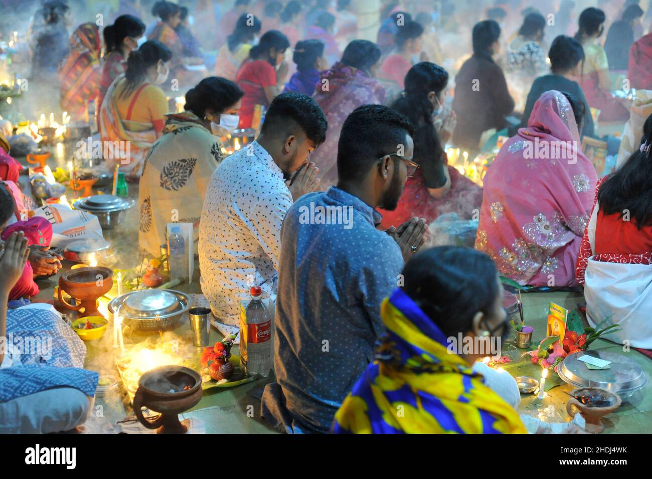 Devotees offer prayers during the ritual called Kartik Brati or Rakher ...