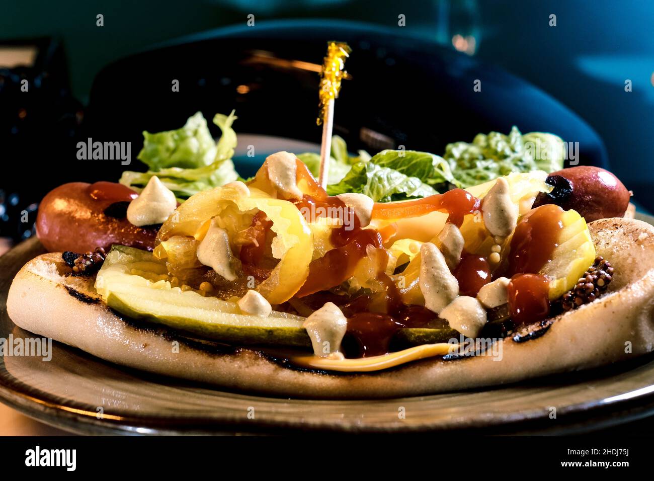 The works hot dog with retro landline corded phone in the background ...